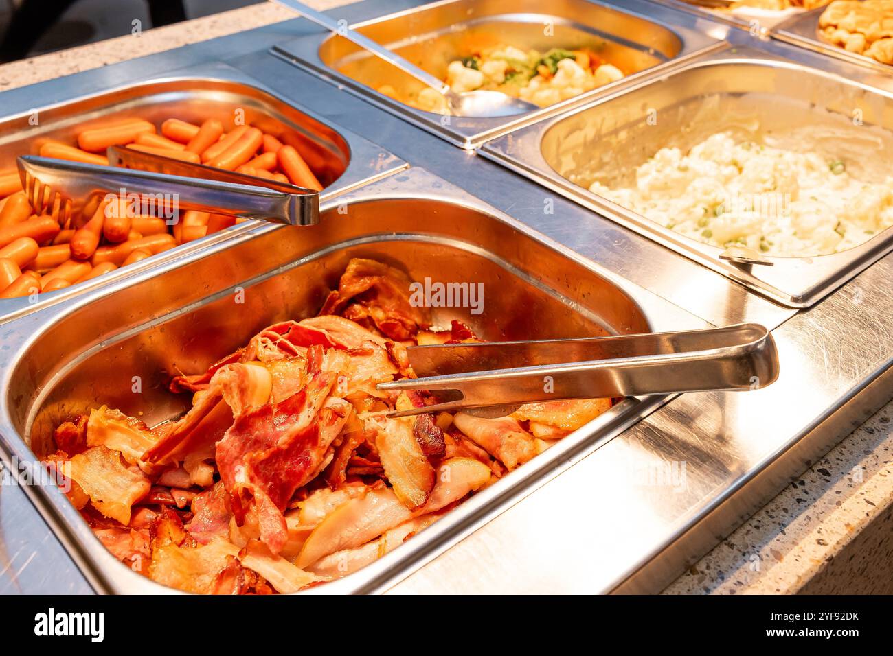 Hot Breakfast Buffet Selection with Bacon, Sausages, and Scrambled Eggs ...