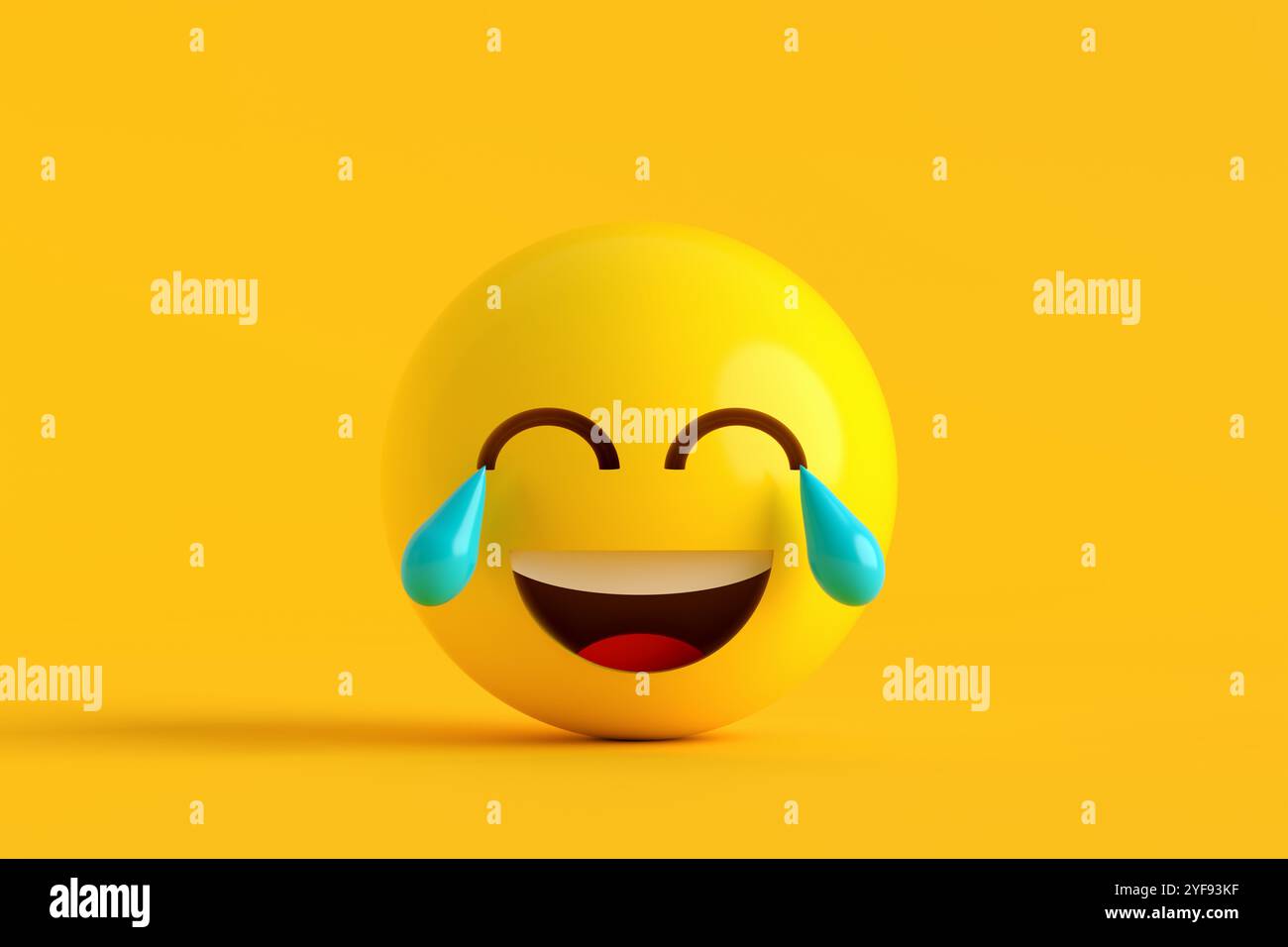 Laughing emoji with tears on a yellow background, expressing extreme ...