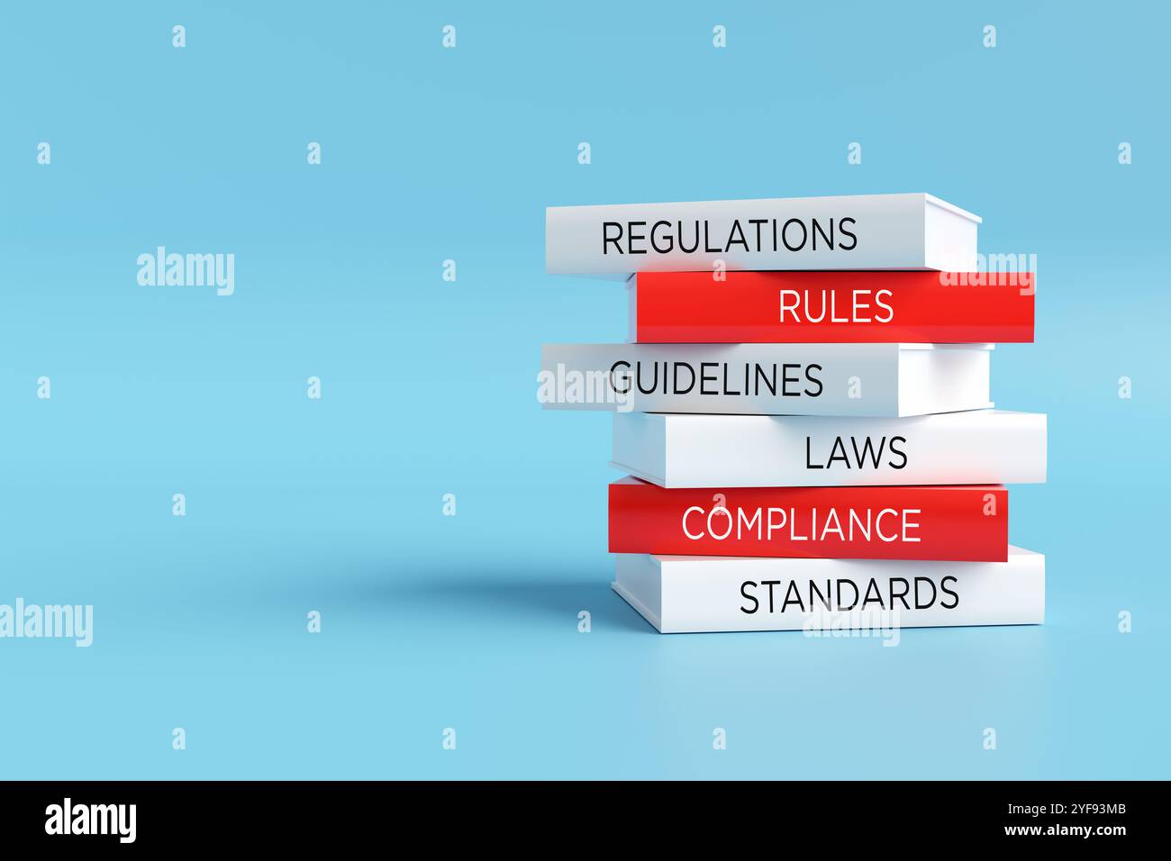 Books forming a stack with words regulations, rules, guidelines, laws, compliance and standards ...