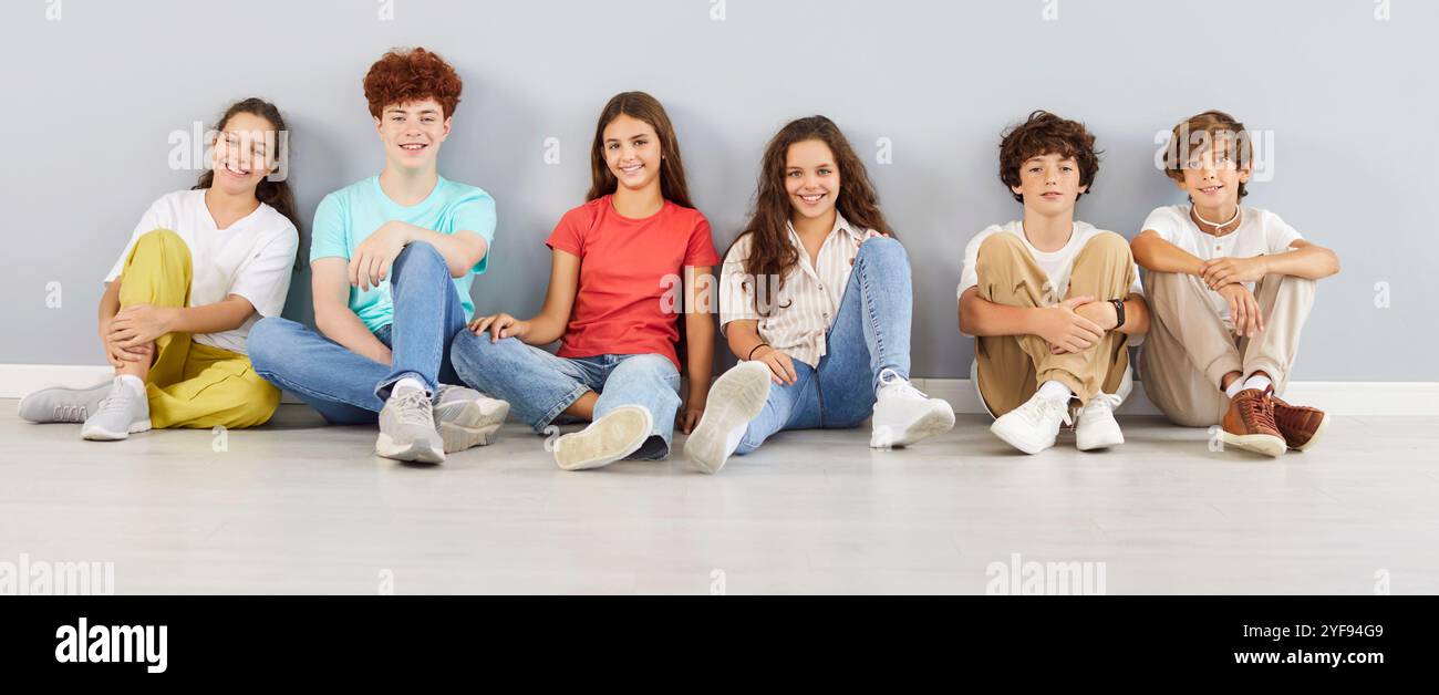 Kids sitting back to back isolated hi-res stock photography and images ...