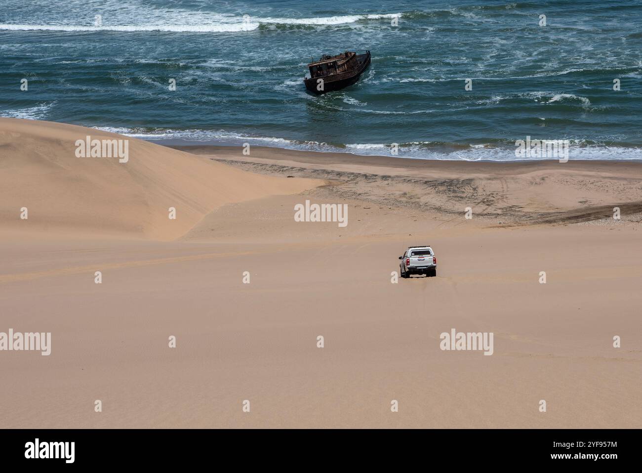 Windhoek. 2nd Nov, 2024. A car runs on the Meob Bay at the Namib ...