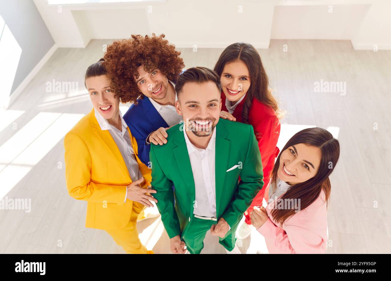 Group Portrait Of Young People In Colorful Business Suits Stock Photo ...
