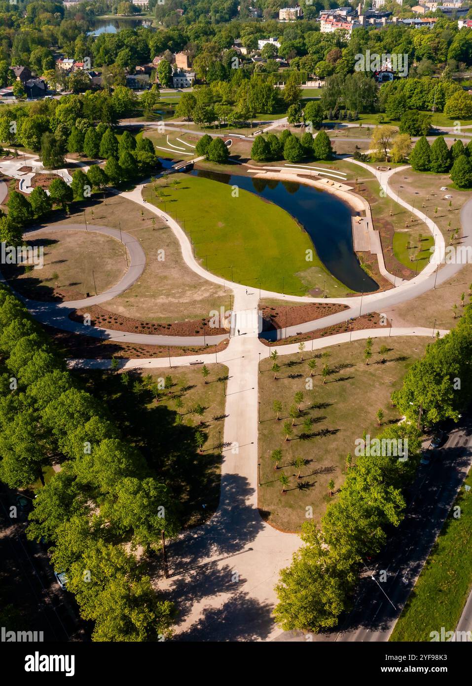 New redesigned Victory park in Riga, Latvia with a pond and pedestrian ...