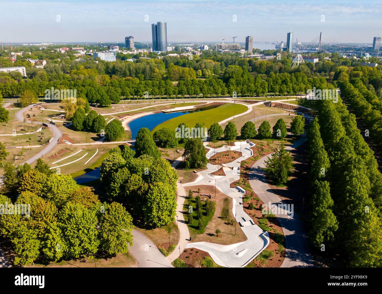 New redesigned Victory park in Riga, Latvia with a pond and pedestrian ...
