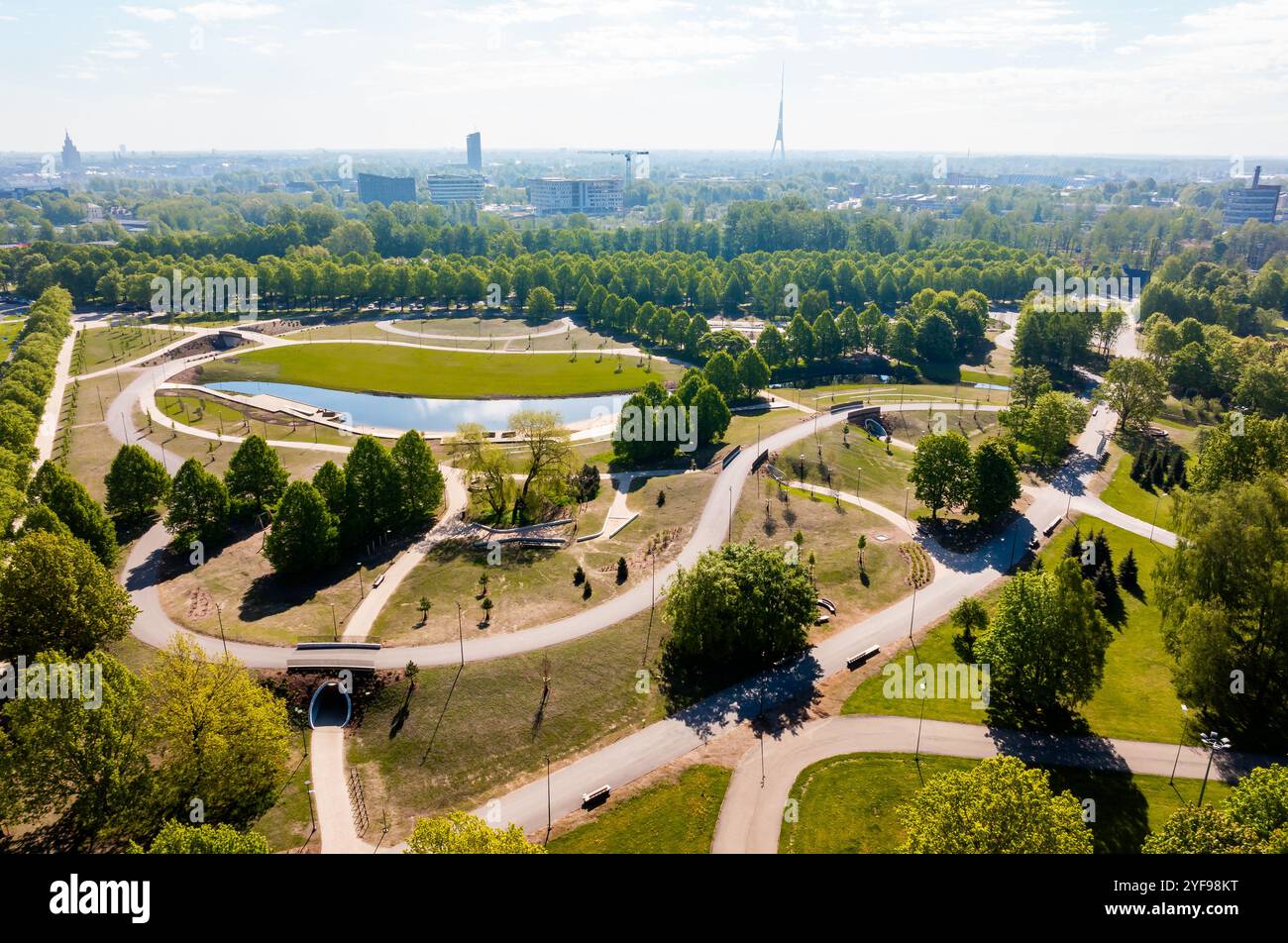 New redesigned Victory park in Riga, Latvia with a pond and pedestrian ...
