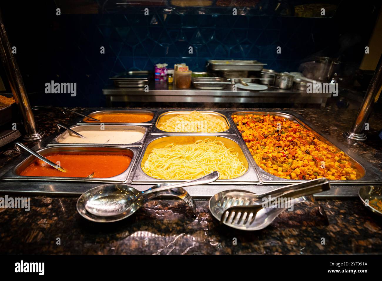 Luxury hotel buffet spread mouth watering selection of hot pasta dishes ...