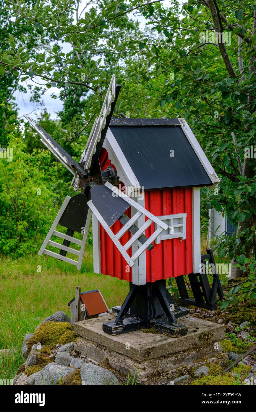 Model of a typical Swedish red windmill in a garden in Blekinge, Sweden ...