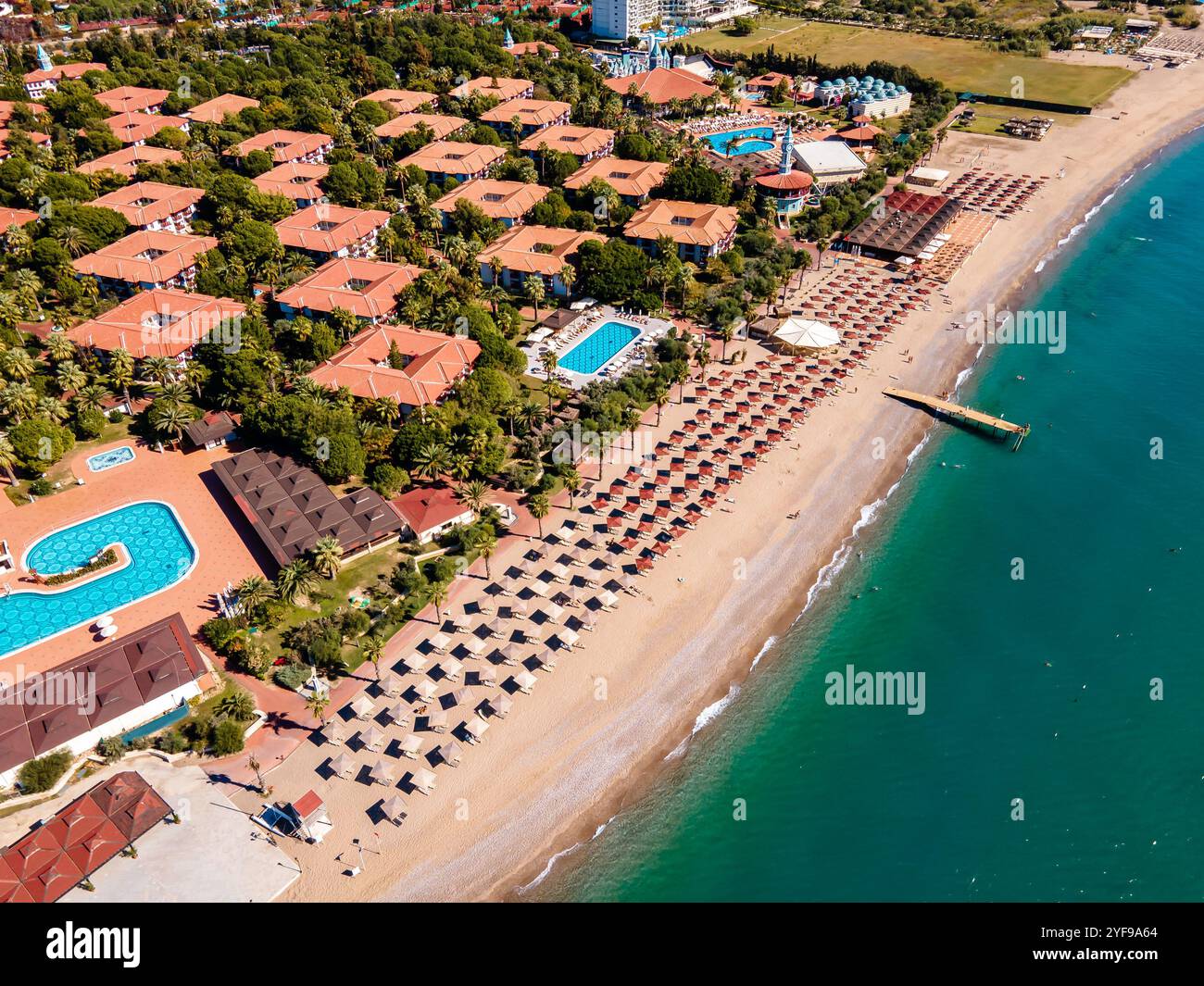 aerial view of a luxury tropical hotel resort, featuring an idyllic ...