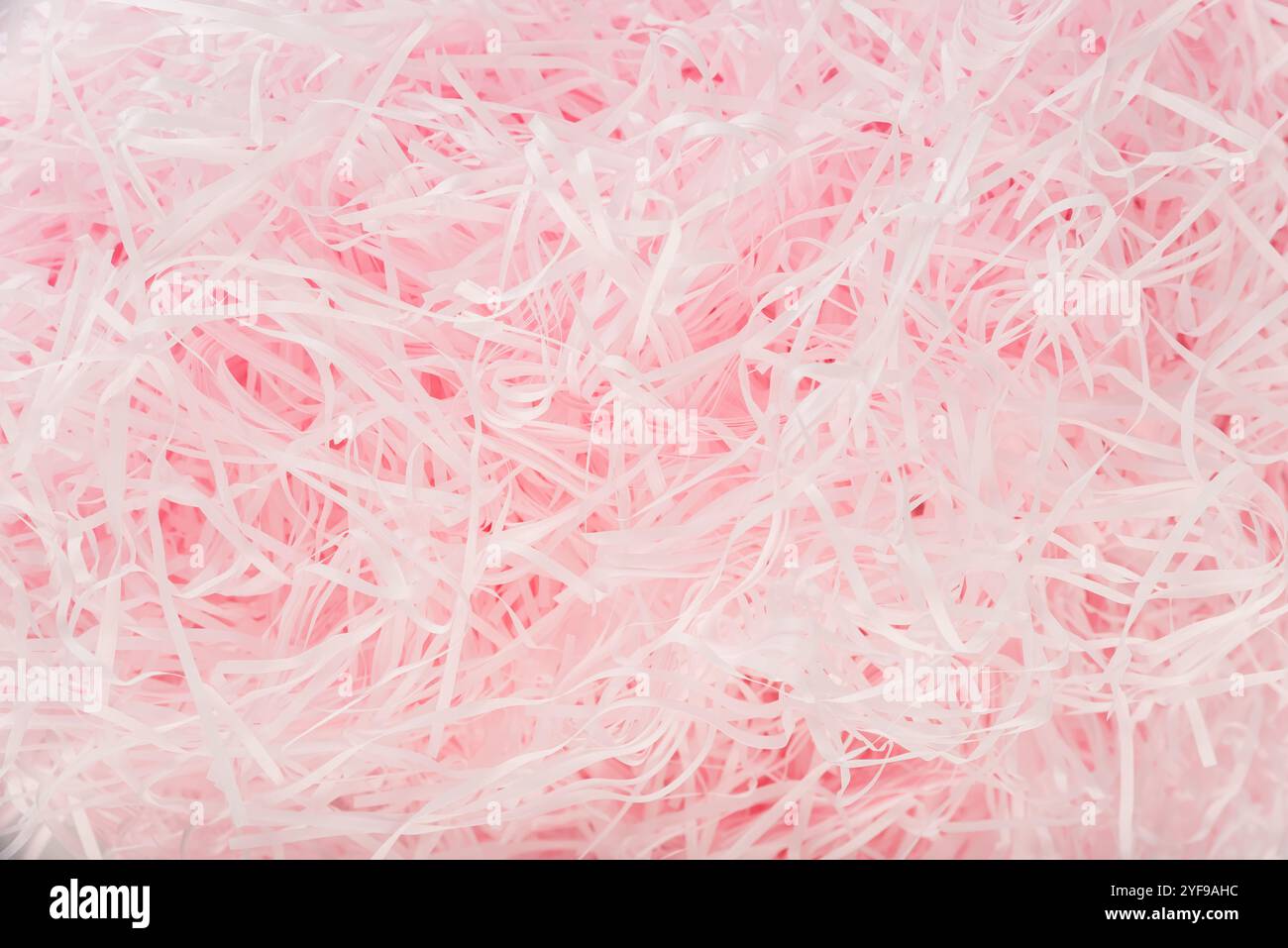 Confetti gift box filler in the box on white background Stock Photo - Alamy