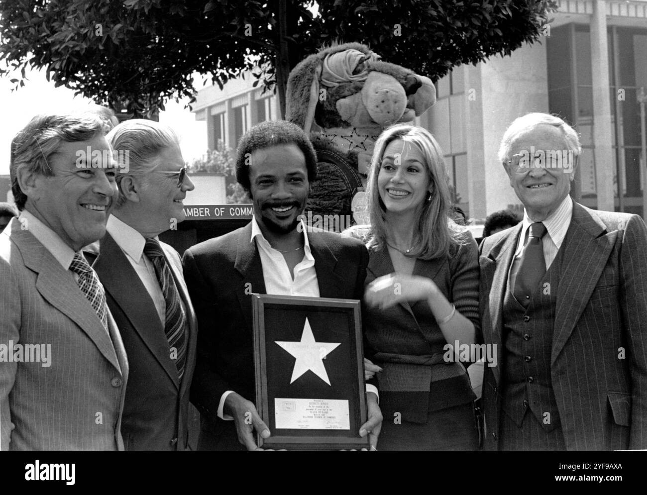 FILE - Musician Quincy Jones and his wife, actress Peggy Lipton, hold ...