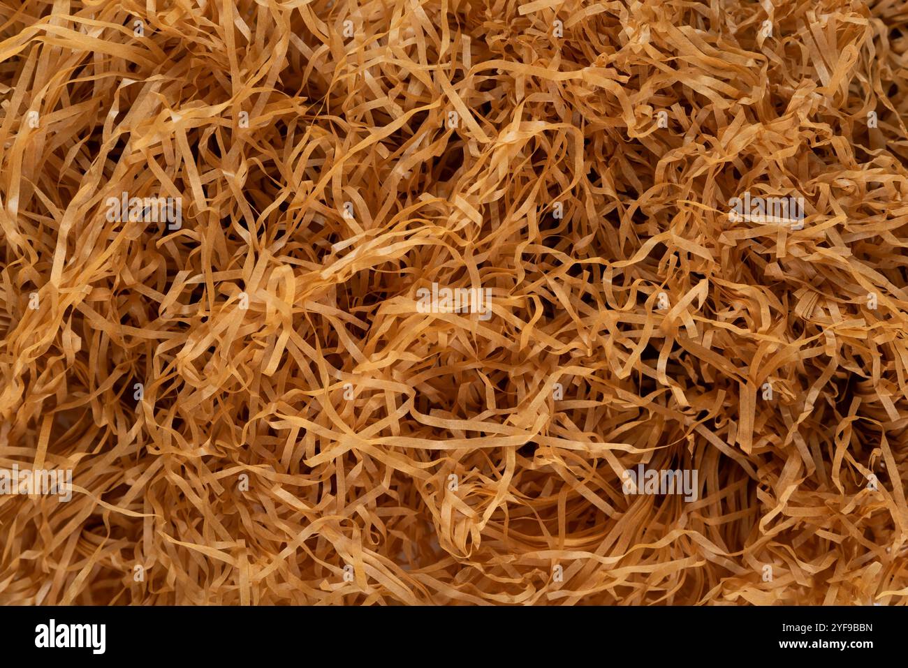 Confetti gift box filler in the box on white background Stock Photo - Alamy