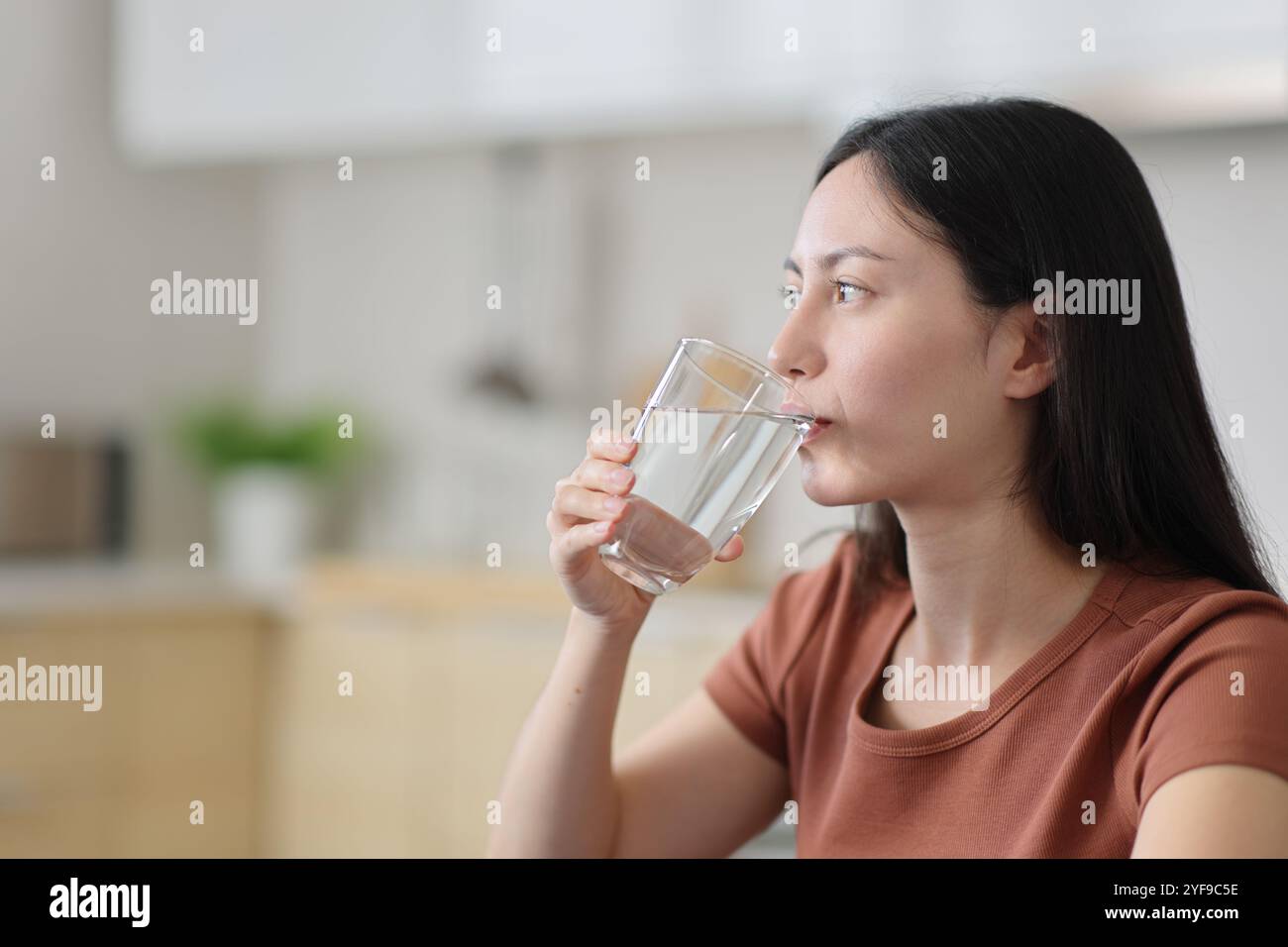 Girl drinking water from tap hi-res stock photography and images - Alamy