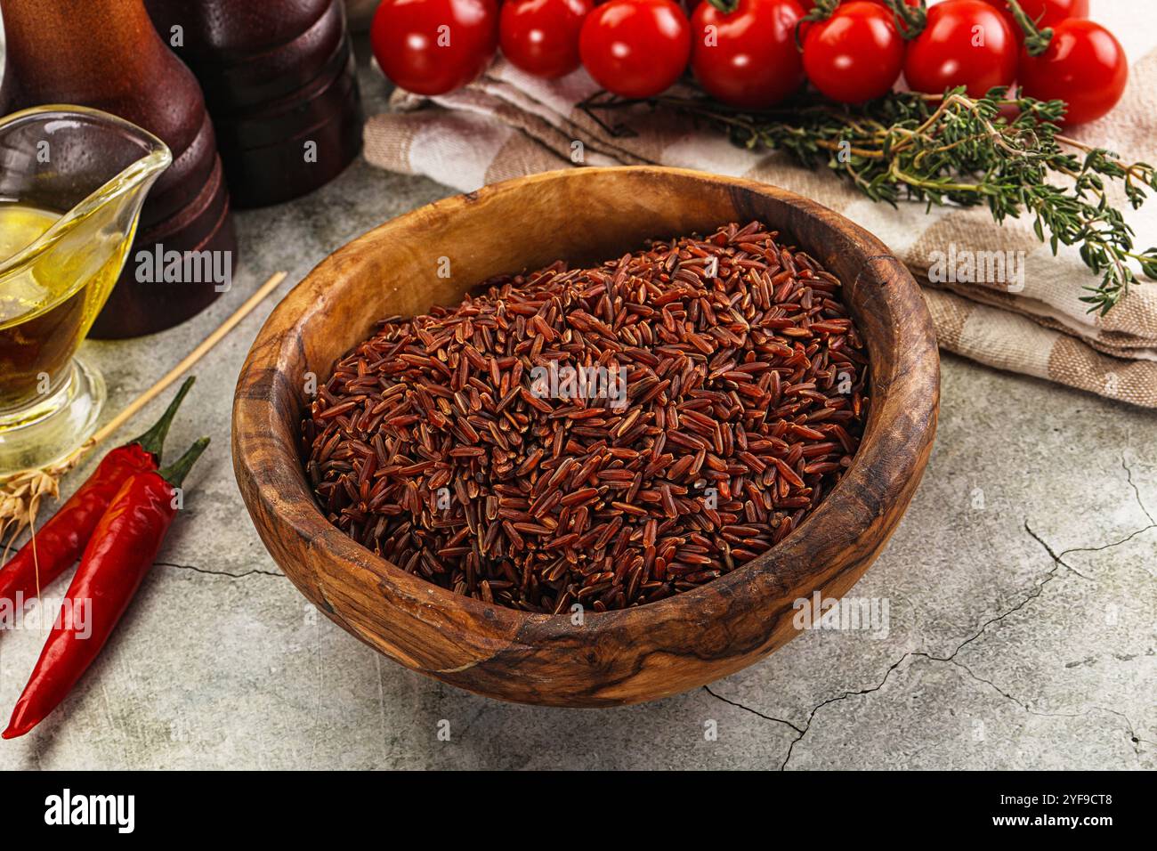 Red raw dry rice grain gor cooking Stock Photo - Alamy