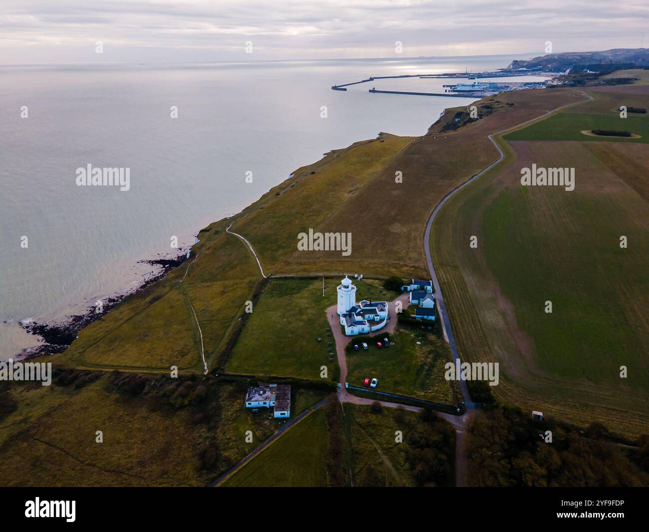 Lighthouse near White Cliffs of Dover. Seven Sisters National park ...