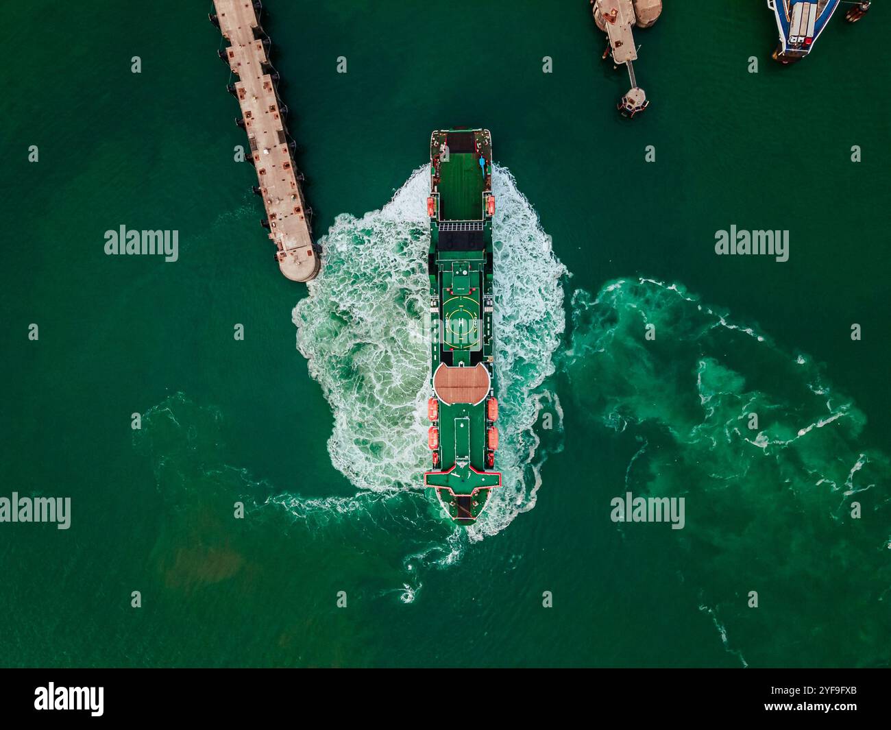 Aerial view of Empty cargo ship in ocean cian blue water Stock Photo ...