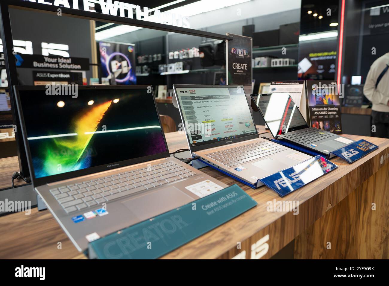 KUALA LUMPUR, MALAYSIA - MARCH 11, 2023: laptops on display at Asus store in Kuala Lumpur Stock ...