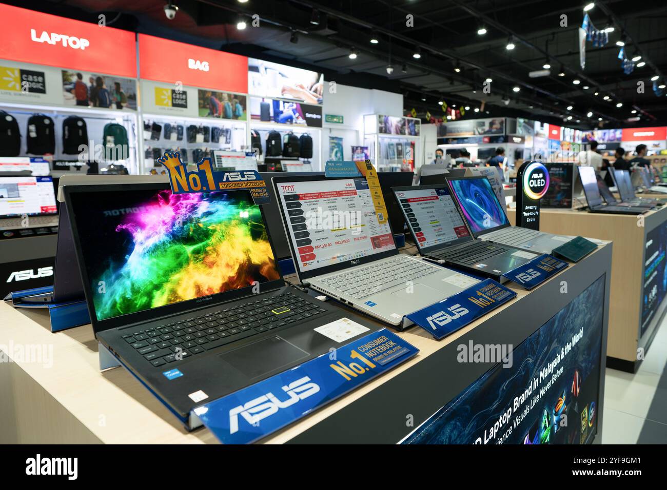 KUALA LUMPUR, MALAYSIA - MARCH 12, 2023: laptops on display at TMT ...