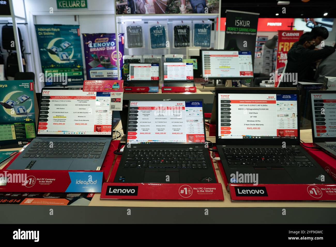 KUALA LUMPUR, MALAYSIA - MARCH 12, 2023: laptops on display at TMT ...