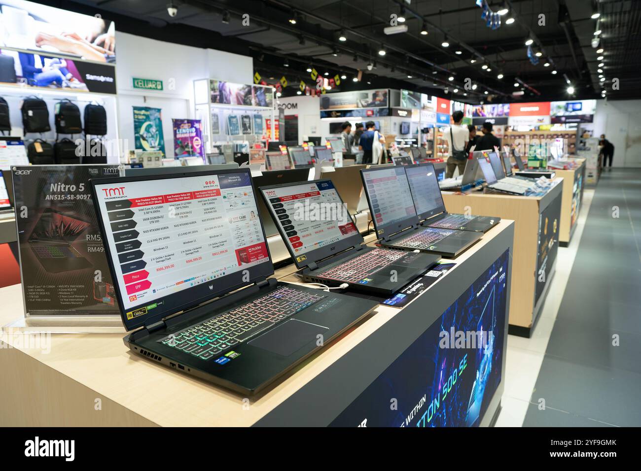 KUALA LUMPUR, MALAYSIA - MARCH 12, 2023: laptops on display at TMT ...