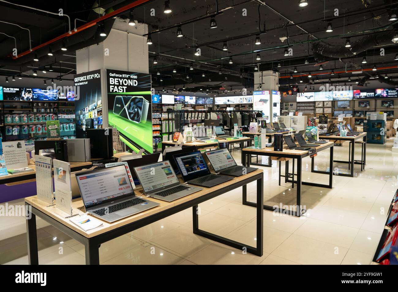 KUALA LUMPUR, MALAYSIA - MARCH 12, 2023: various laptops on display at ...