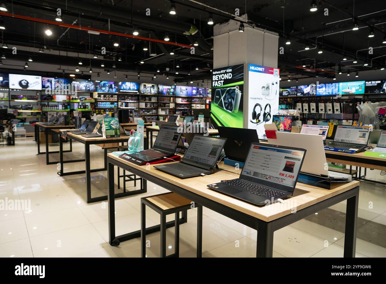 KUALA LUMPUR, MALAYSIA - MARCH 12, 2023: various laptops on display at Brightstar store, Plaza ...