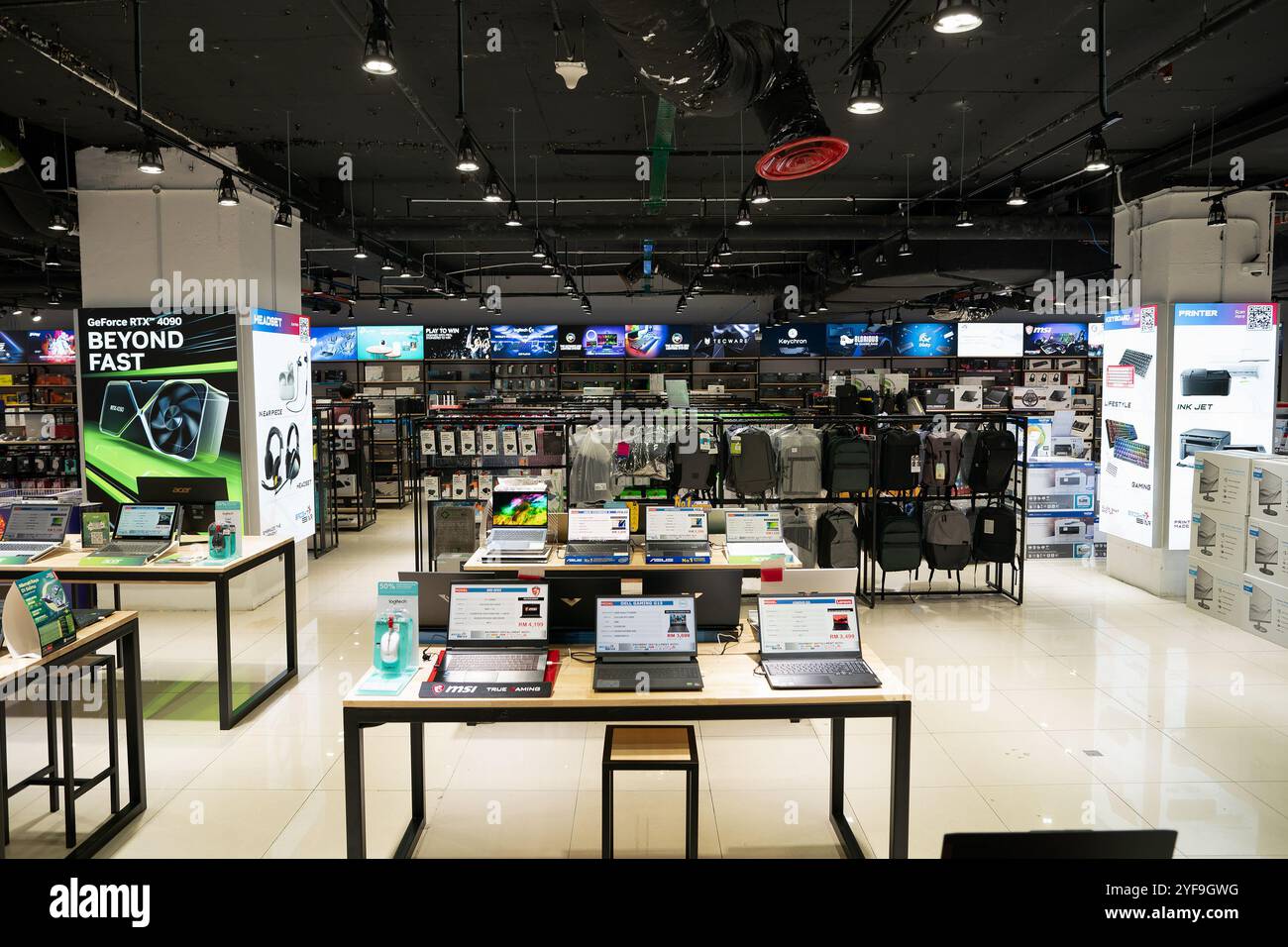 KUALA LUMPUR, MALAYSIA - MARCH 12, 2023: various laptops on display at ...