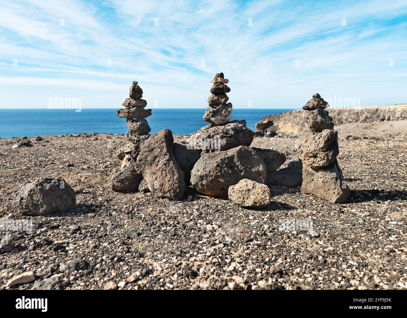 Amazing landscape with lava stone towers, balanced stacked rocks on ...