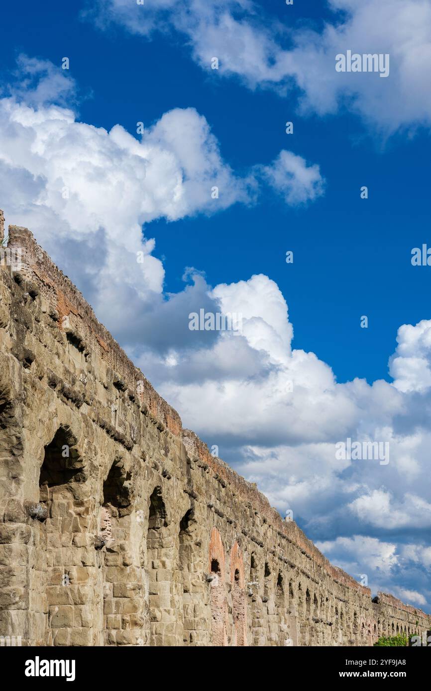 Ancient roman aqueduct beautiful arches ruins in Rome public park with ...