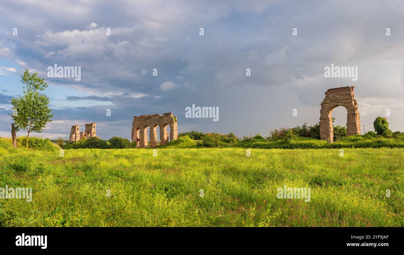 Ancient roman aqueduct ruins in Rome countryside Stock Photo - Alamy