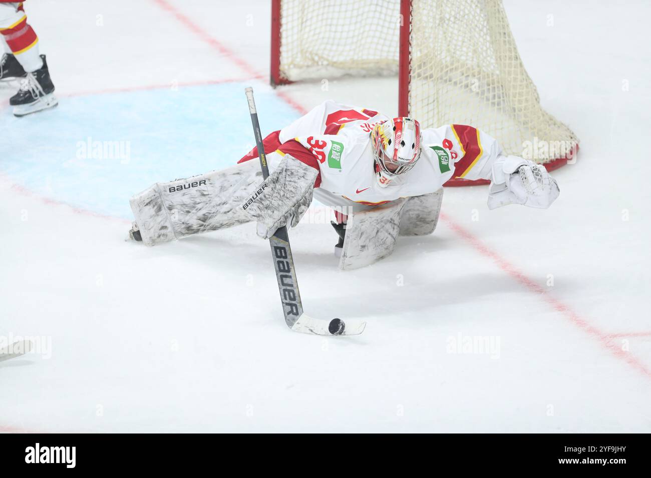 Chinese goalkeeper Wang Yuqing is defending. Beijing,China.3rd November ...