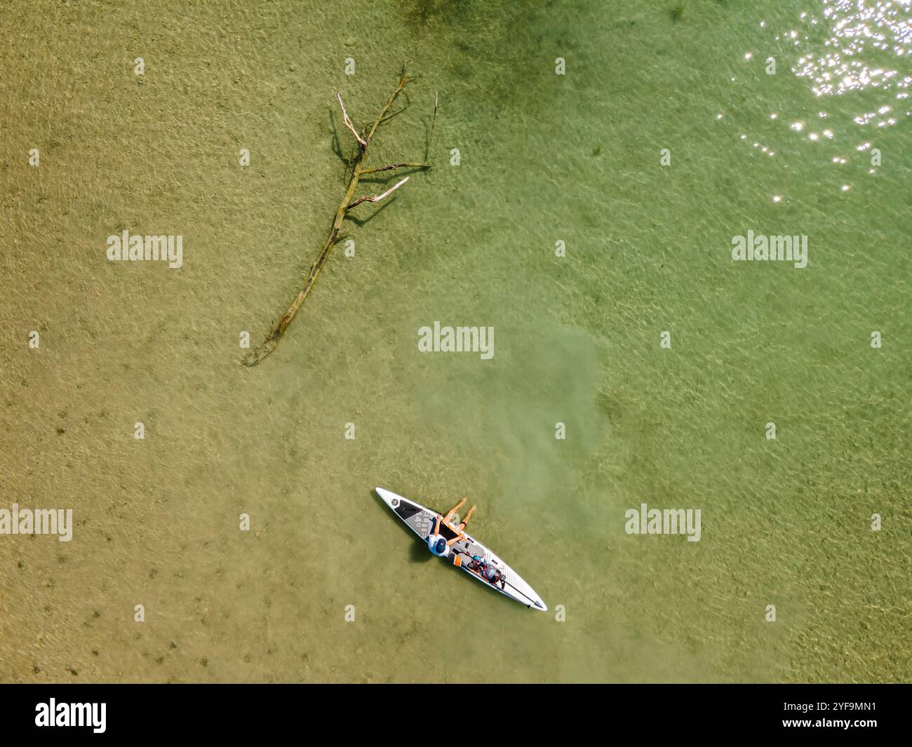 Top View of Sporty Man Sitting on SUP Stand-Up Paddle Board in Lake ...