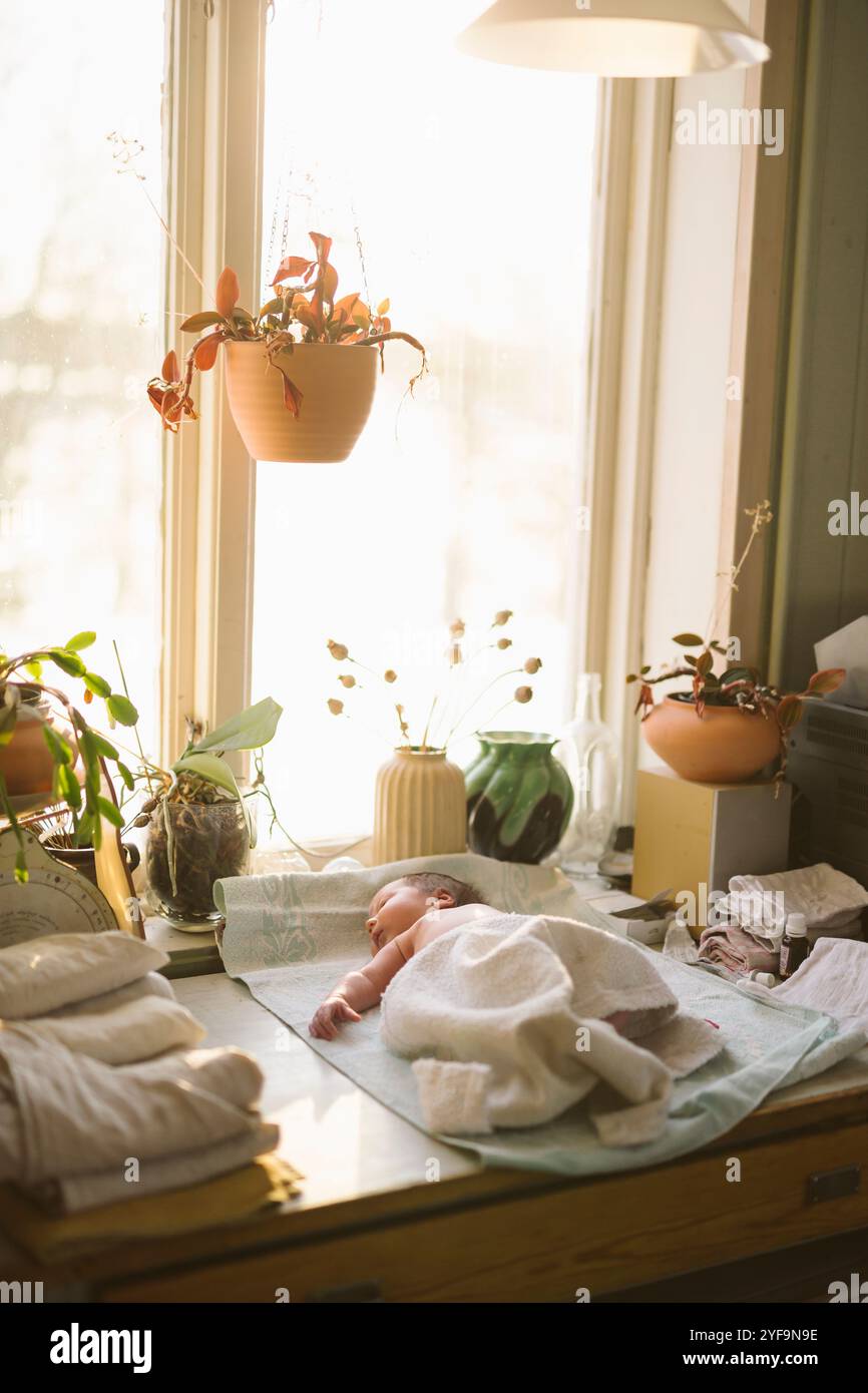 Baby near window hi-res stock photography and images - Alamy