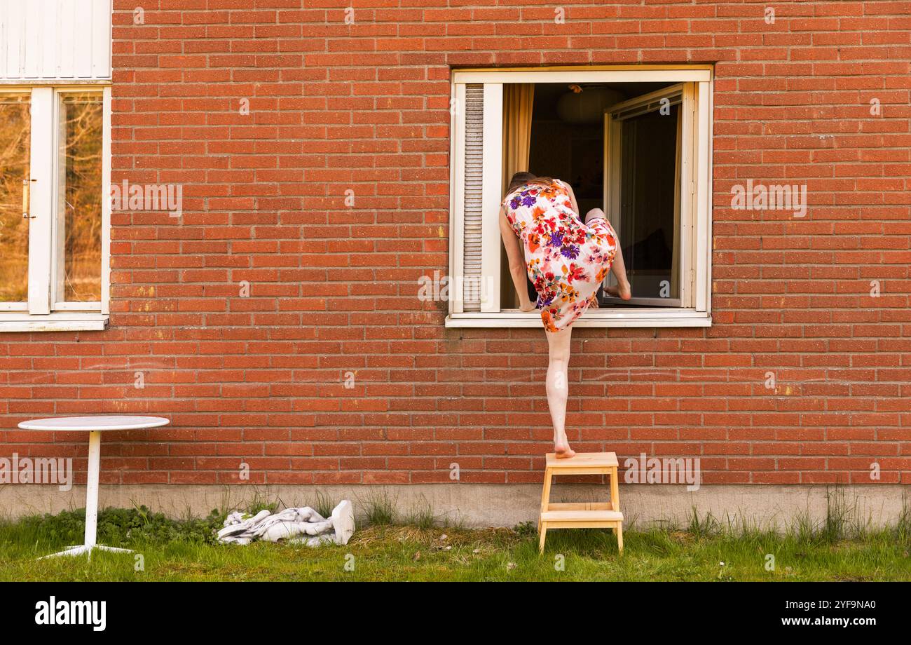 Person entering house hi-res stock photography and images - Alamy