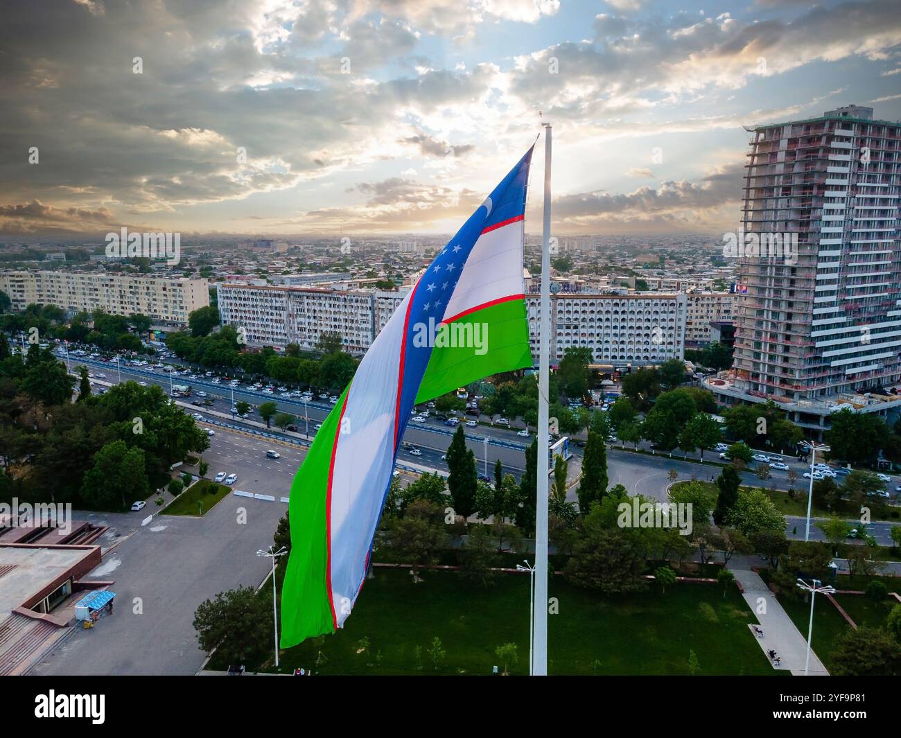 Aerial view of Majestic Uzbekistan National Flag at the Bunyodkor ...