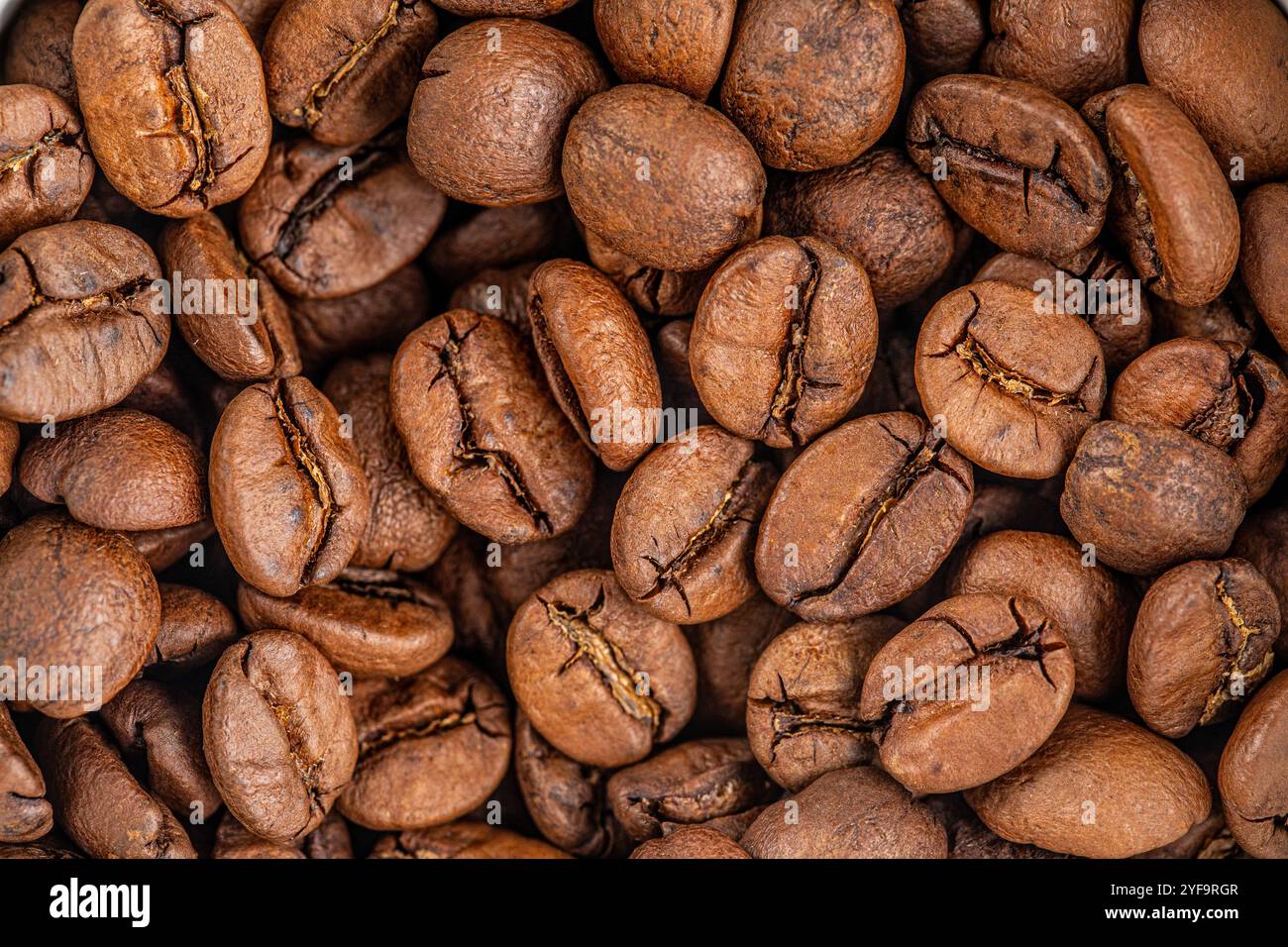 Dark coffee grains macro beans hi-res stock photography and images - Alamy