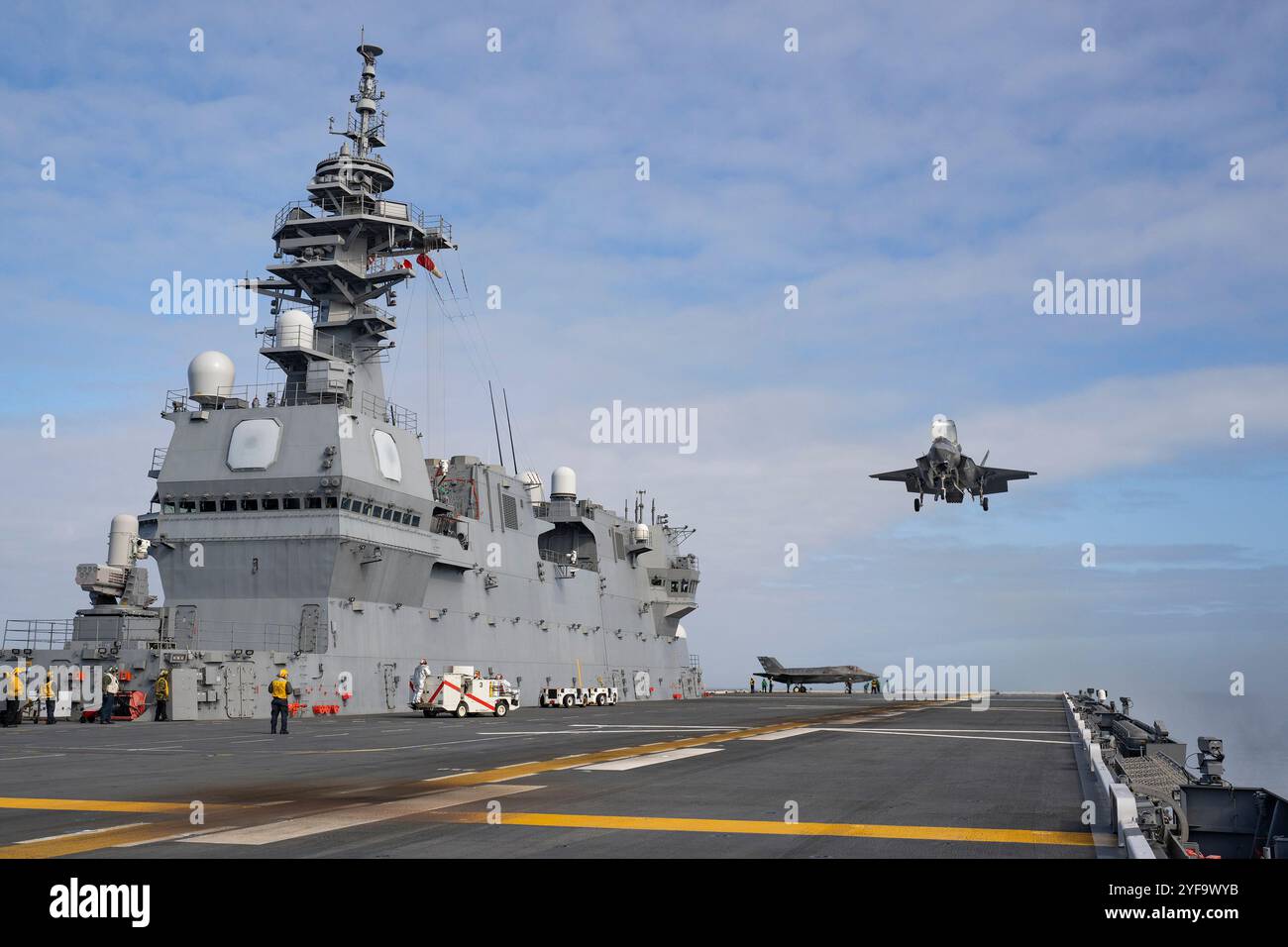 An F-35B Lightning II executes a vertical landing aboard Japan Maritime ...