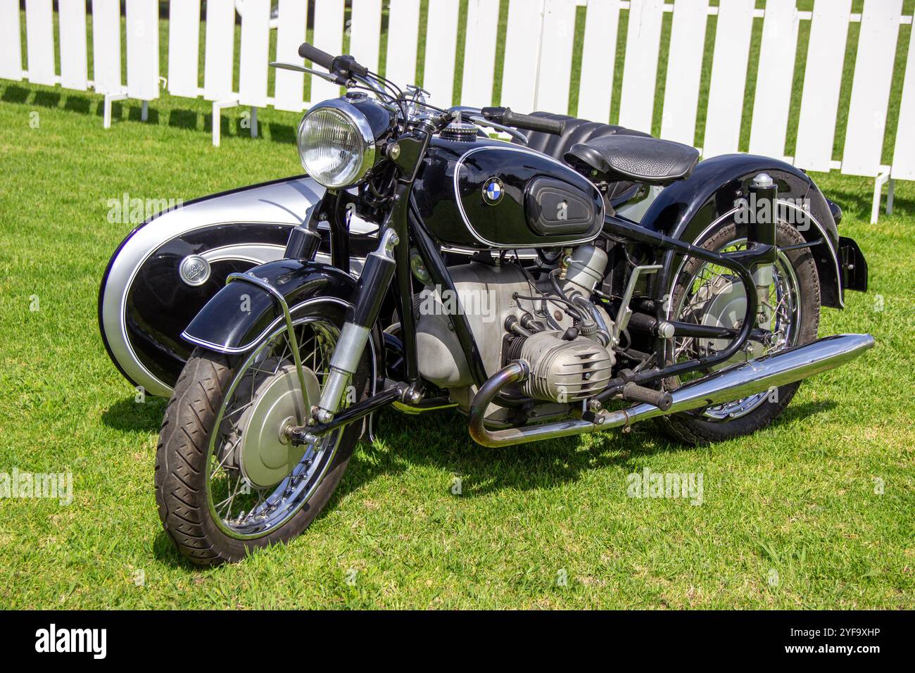 Classic bmw r50 motorcycle with sidecar from 1955, parked on a grassy ...