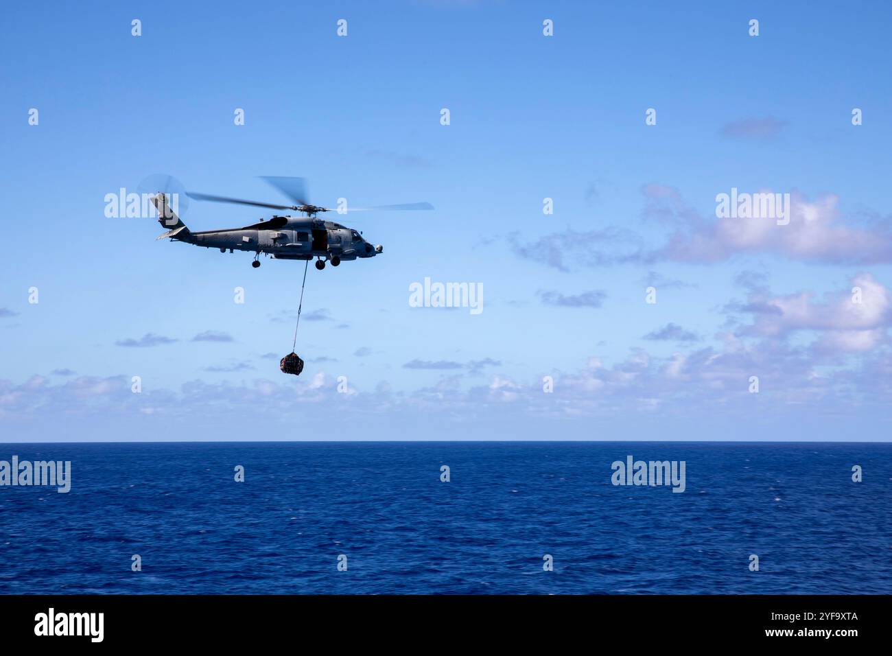 241030-N-NF288-162 PHILIPPINE SEA (Oct. 30, 2024) An MH-60R Sea Hawk ...