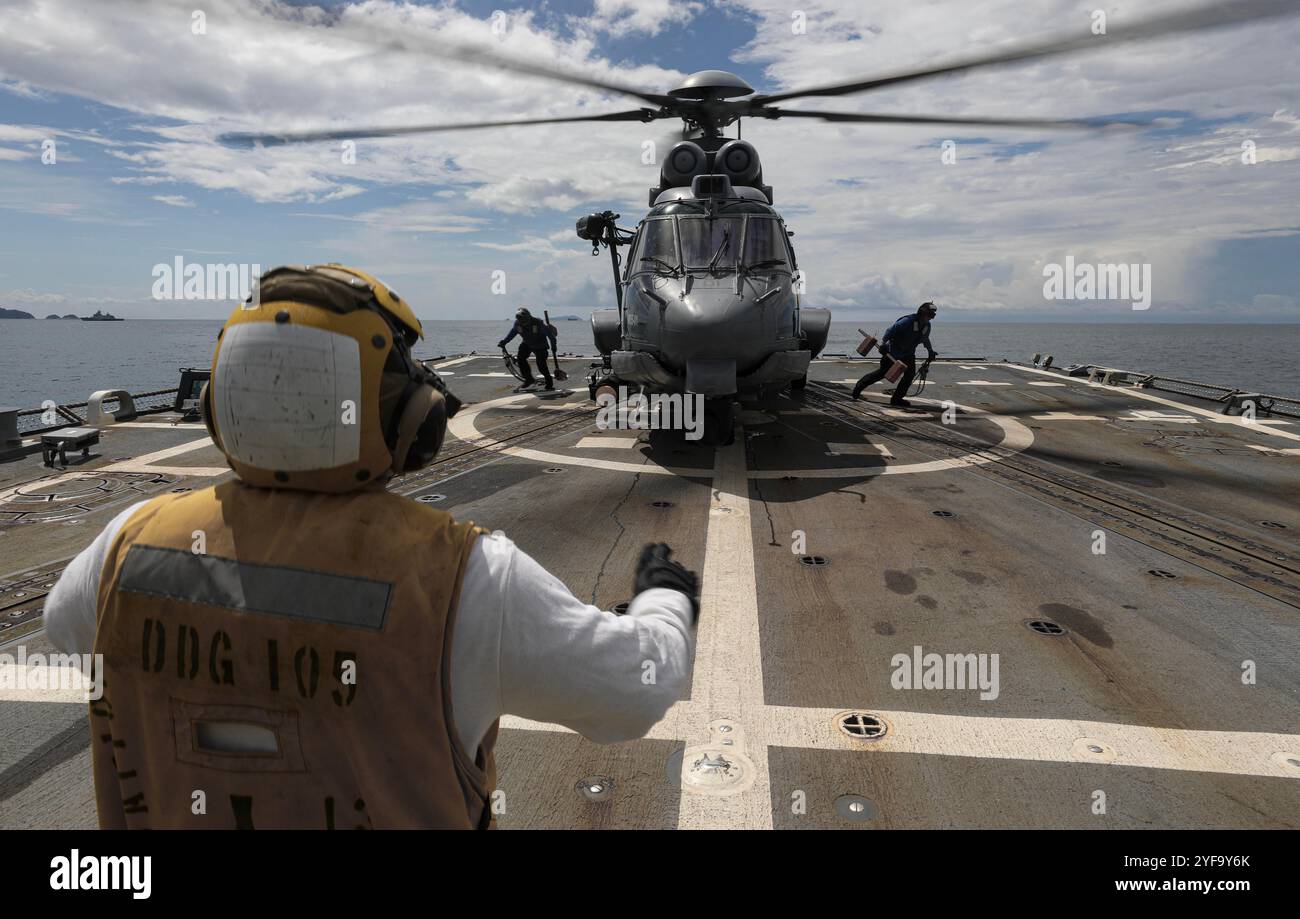 ANDAMAN SEA (Nov. 3, 2024) – U.S. Navy Sailors remove chocks and chains ...