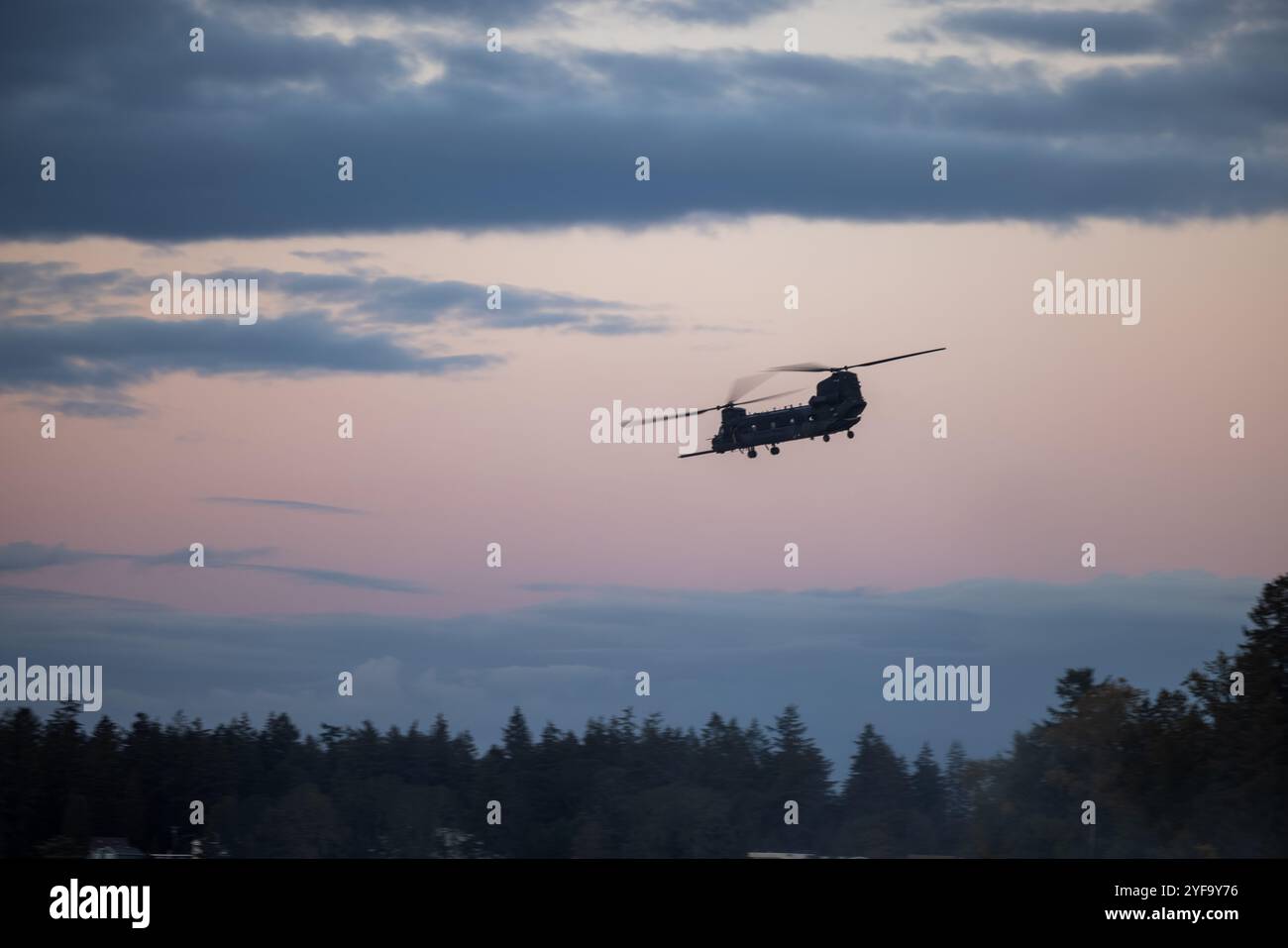A U.S. Army MH-47 Chinook helicopter transports U.S. Marines with ...