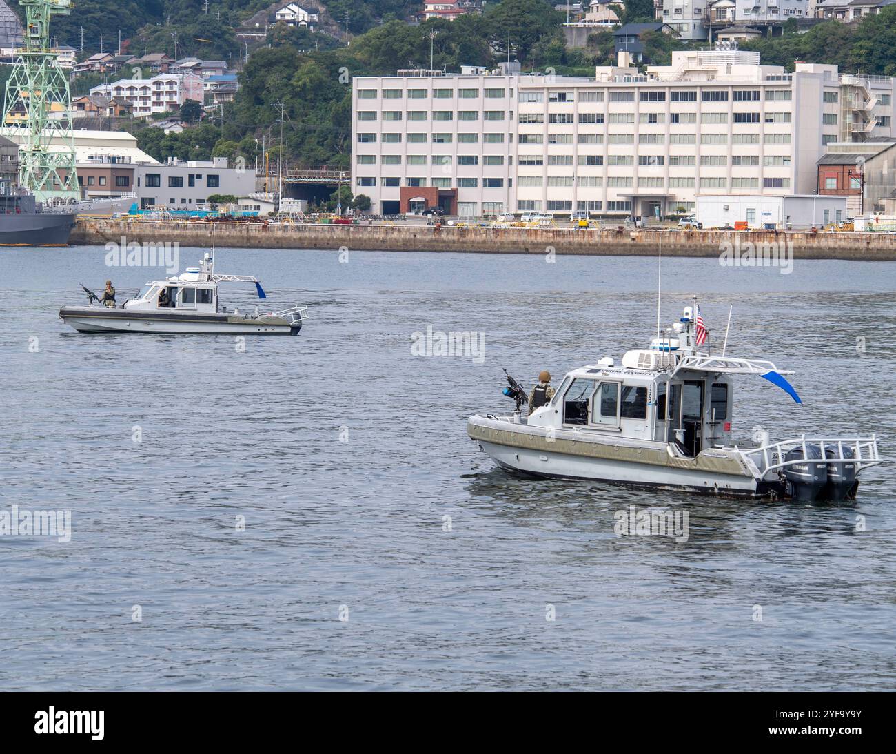 Sailors assigned to Commander, Fleet Activities Sasebo (CFAS), conduct ...