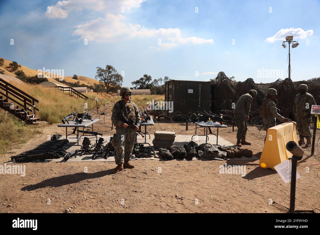 Sailors assigned to Naval Mobile Construction Battalion (NMCB) 4 wait ...