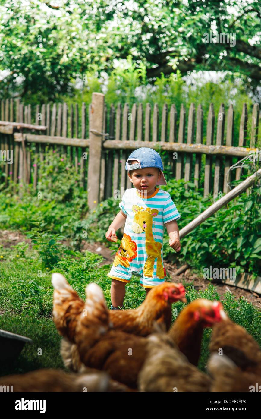 Children playing on a farm hi-res stock photography and images - Alamy