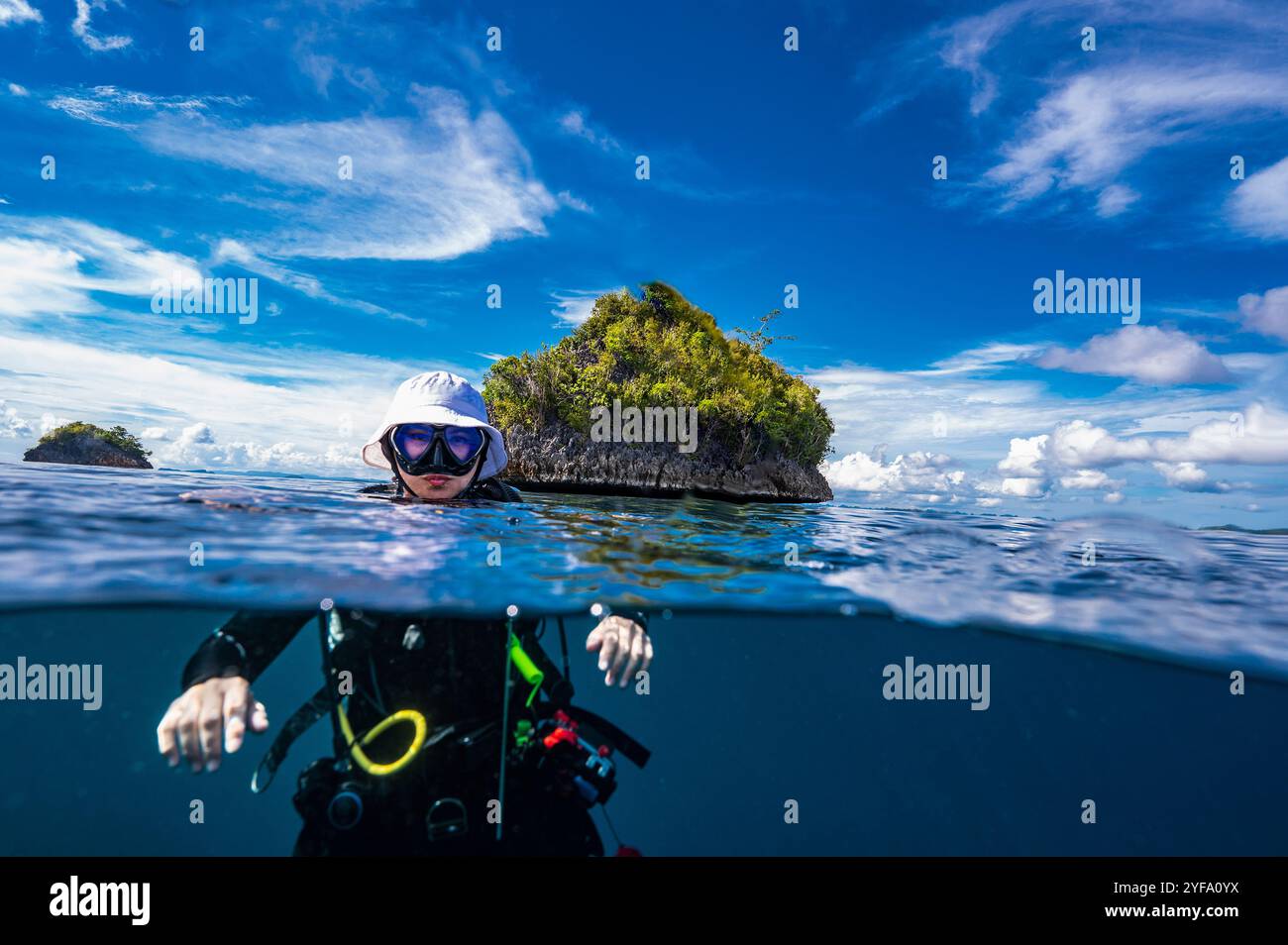 diver floating on the surface in Raja Ampat Stock Photo - Alamy