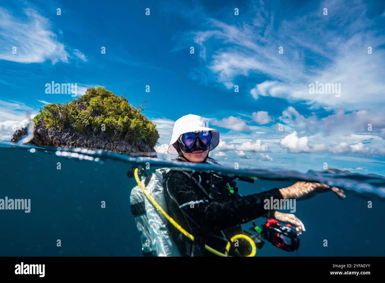 Scuba diver floating surface water hi-res stock photography and images ...