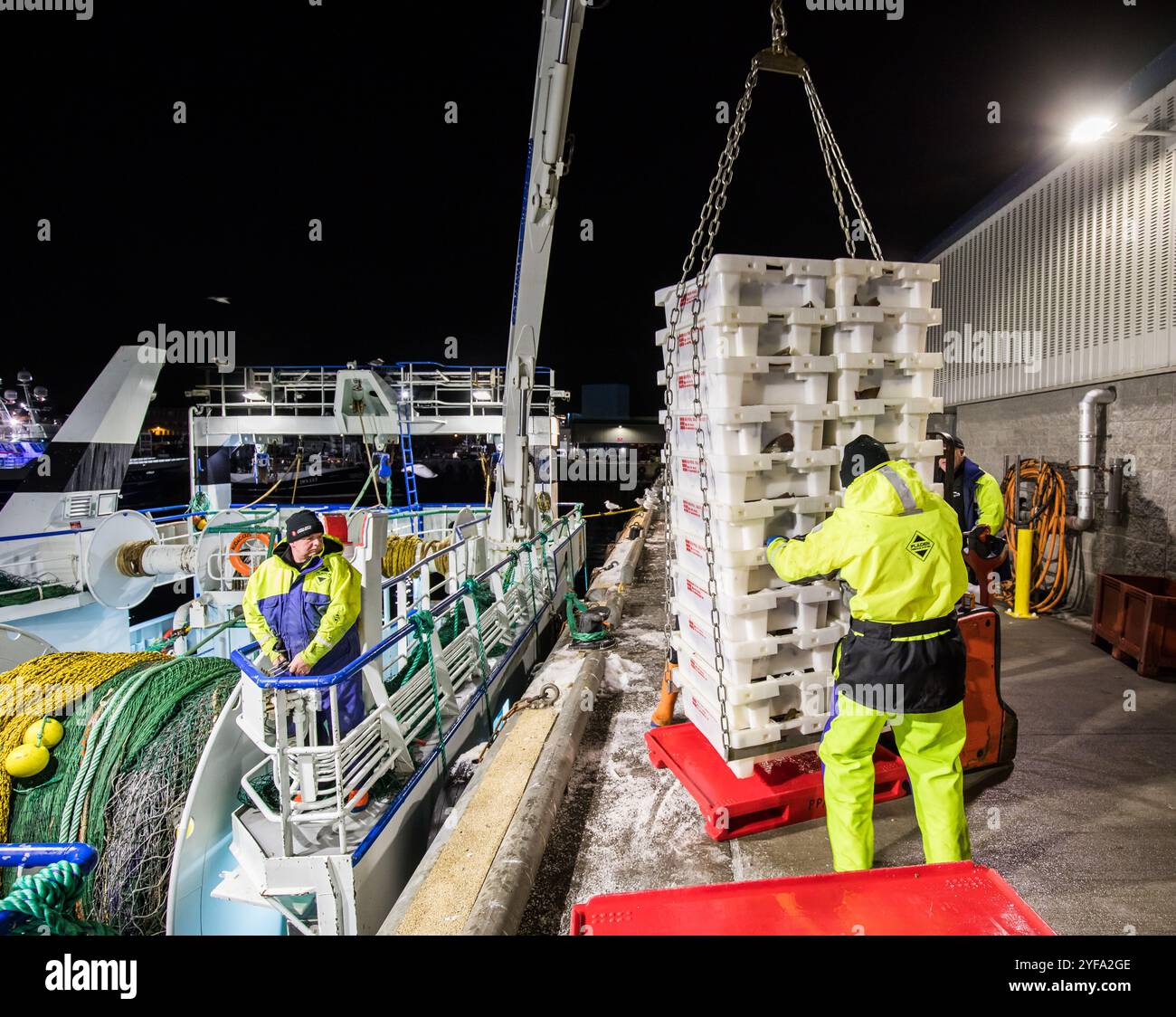 Unloading fish port night hi-res stock photography and images - Alamy