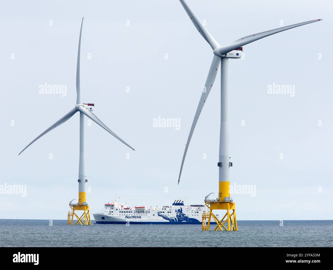 Northlink Ferry passing wind turbines in the sea Stock Photo - Alamy