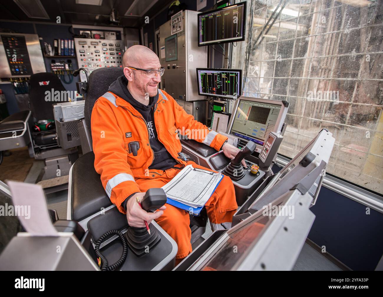Drill operator on a north sea offshore oil rig Stock Photo - Alamy