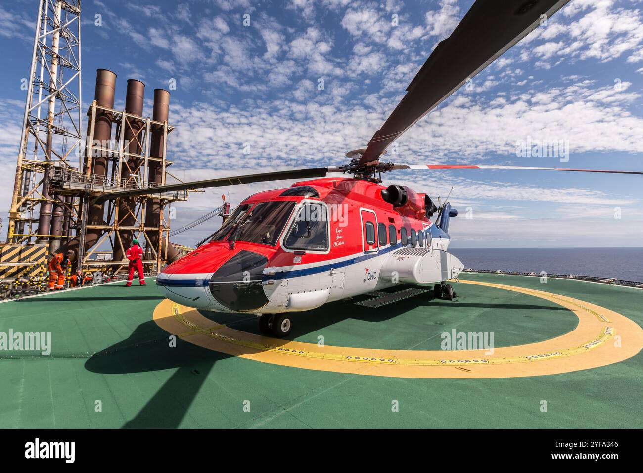 Helicopter on the helipad of an offshore oil rig Stock Photo - Alamy