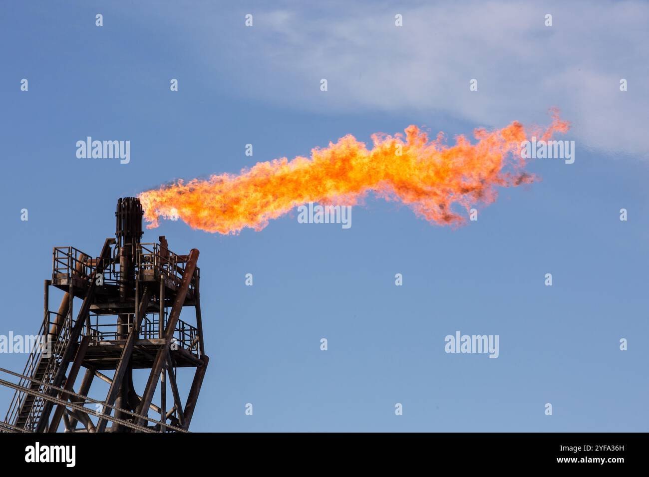 Flare from an oil rig at sea Stock Photo - Alamy